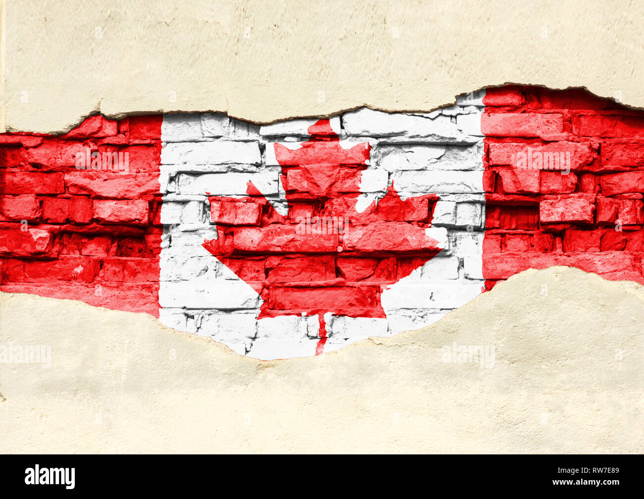 National flag of Canada on a brick background. Brick wall with ...