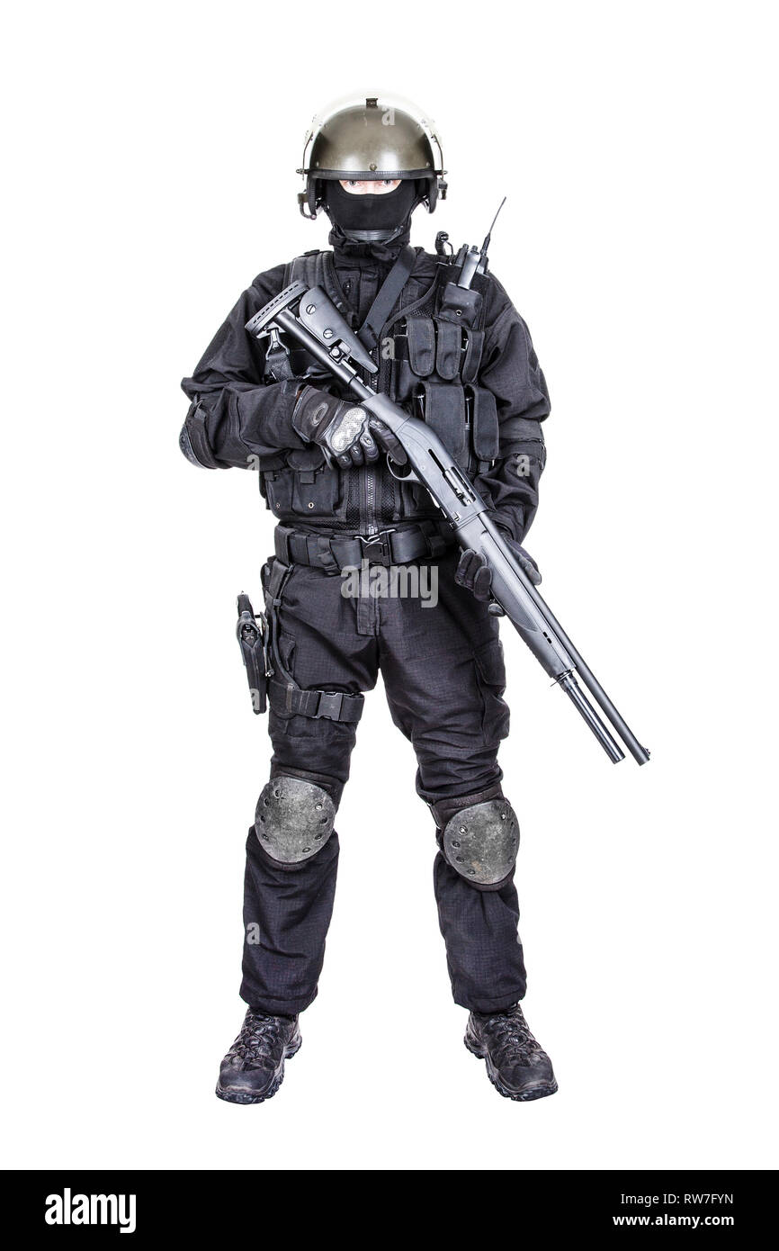 Spec ops soldier in black uniform and face mask with shotgun Stock ...