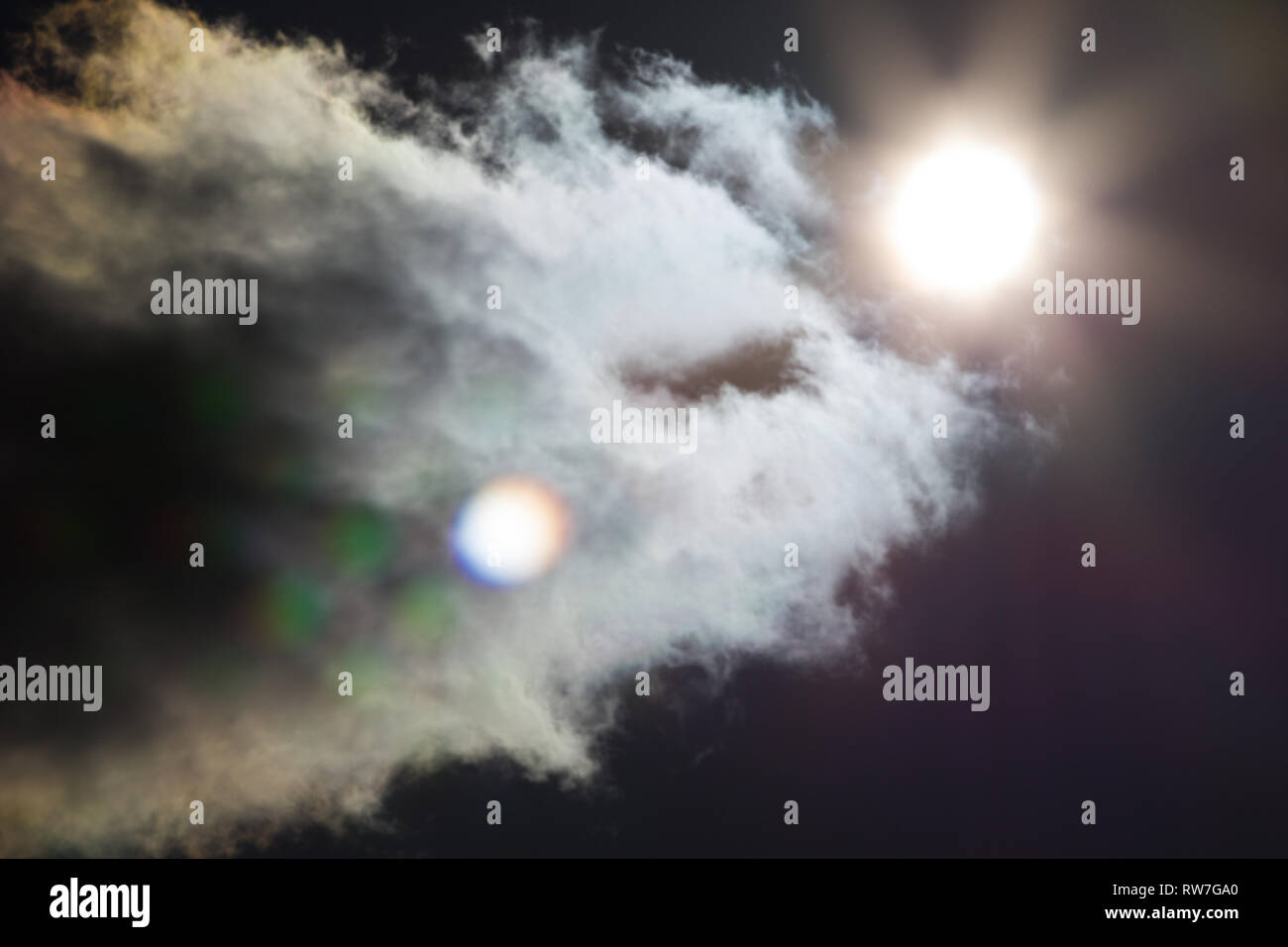 Starburst Sun and Clouds Stock Photo - Alamy