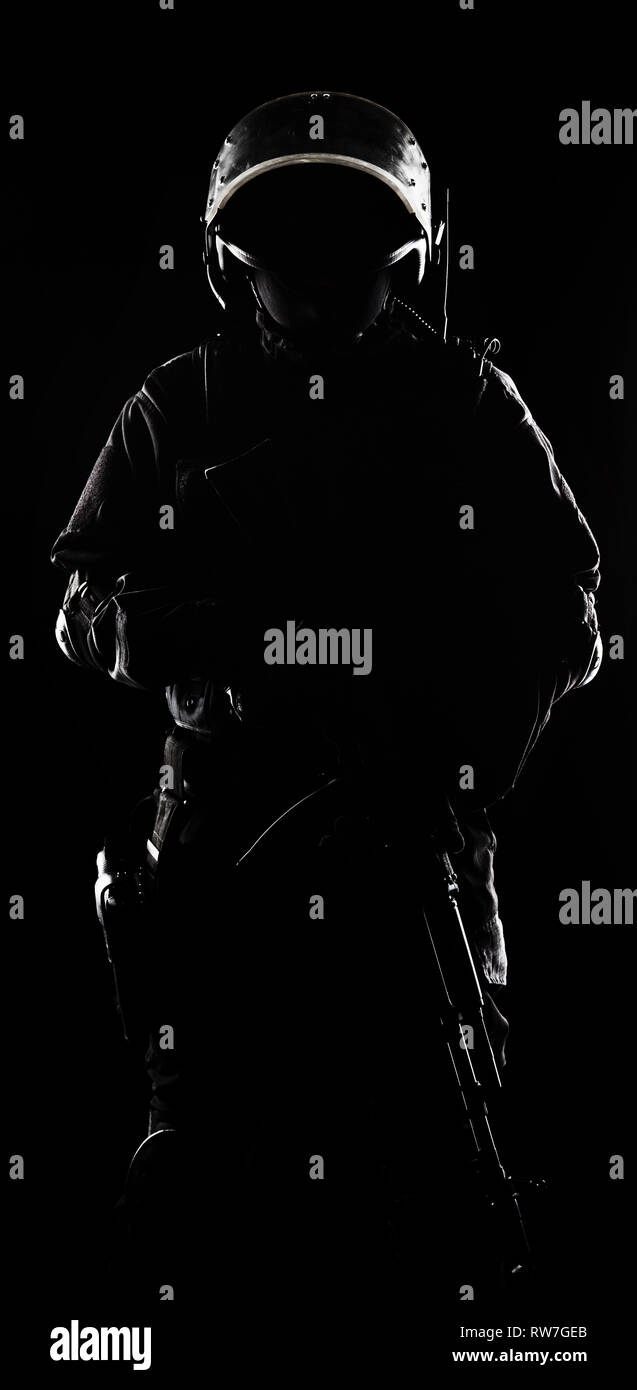 Contour shot of spec ops soldier on black background Stock Photo - Alamy