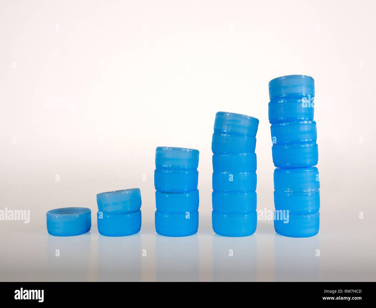 A diagram made of plastic caps. Pollution with plastic A concept ...