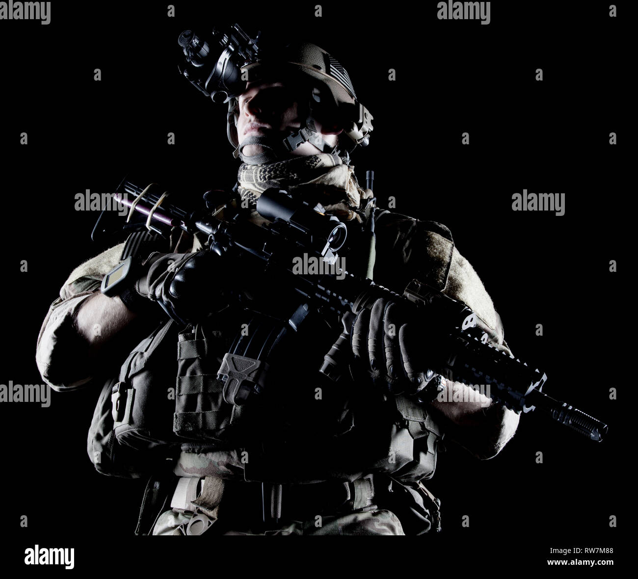 United States Army ranger with assault rifle on dark background Stock ...