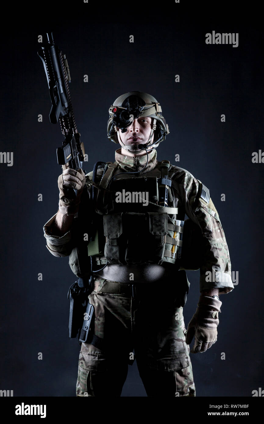 United States Army ranger with assault rifle on dark background Stock ...