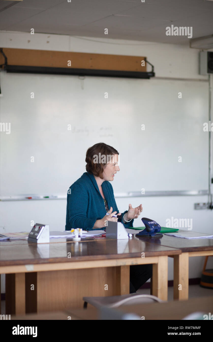 teacher at a further education college teaching in a classroom Stock ...