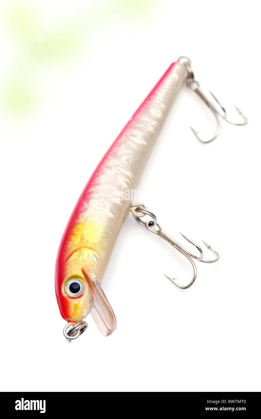 Plastic fishing lure on a white background Stock Photo - Alamy