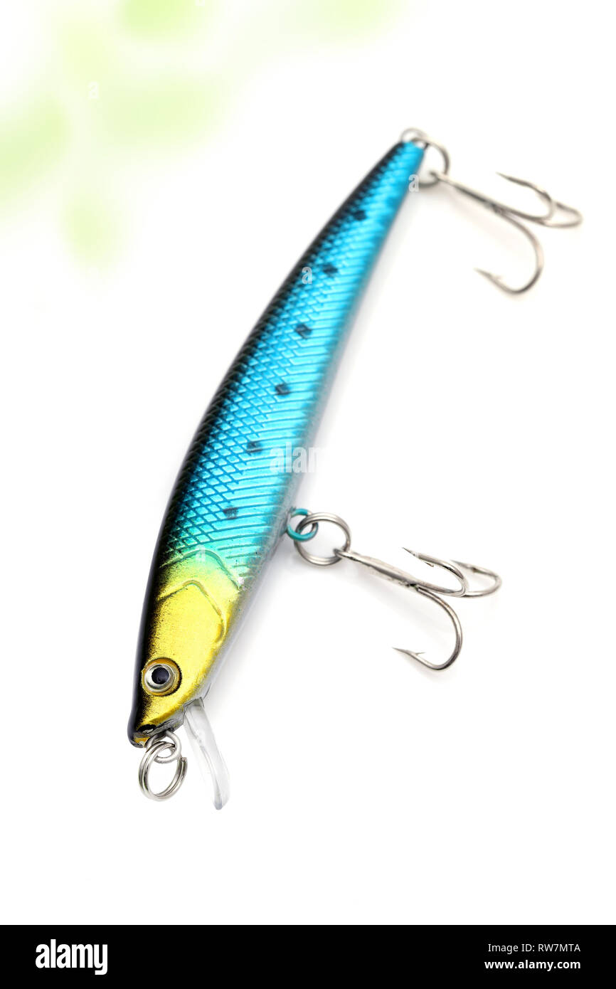 Plastic fishing lure on a white background Stock Photo - Alamy