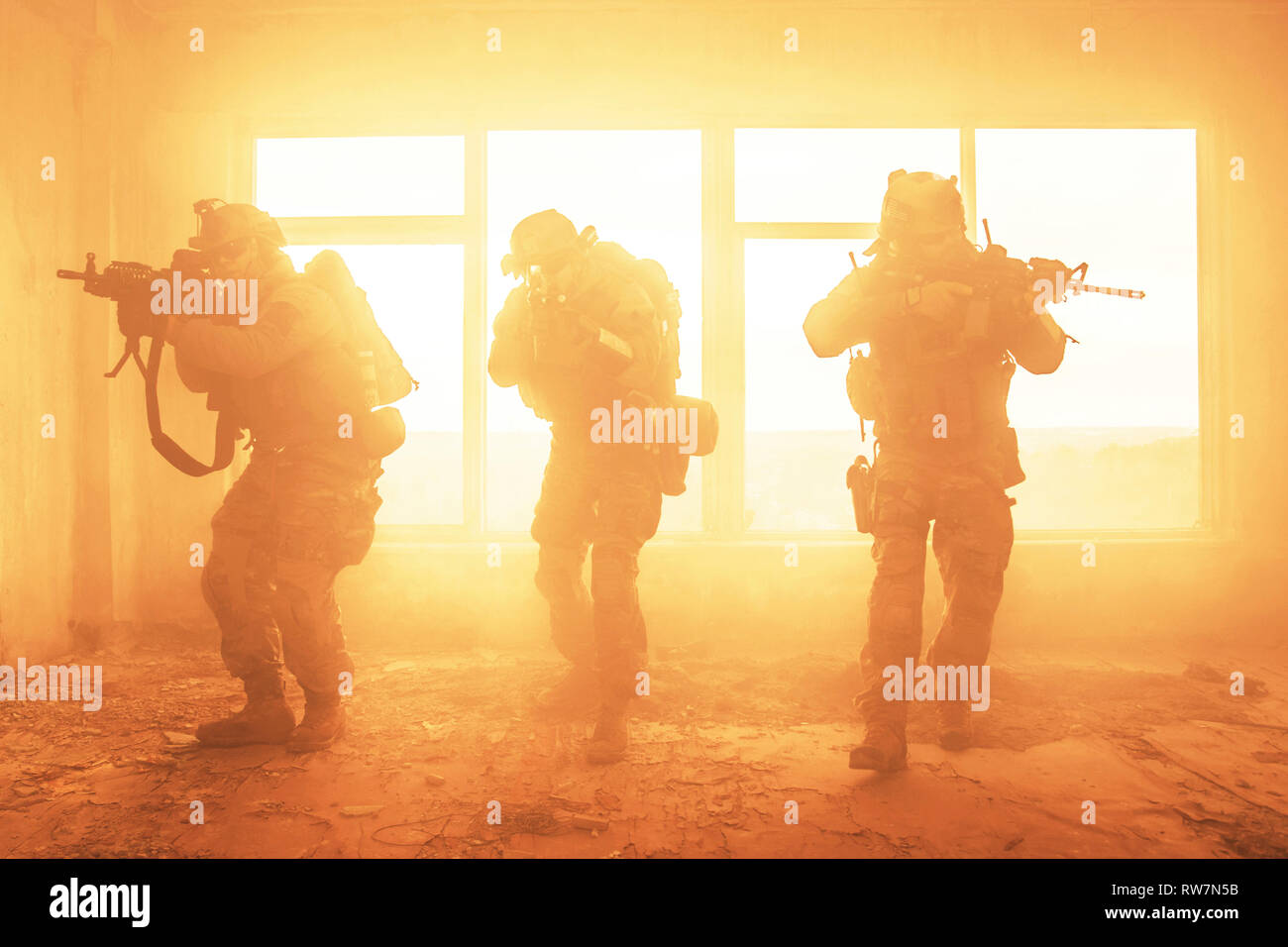 United States Army rangers during a military operation in the smoke and ...