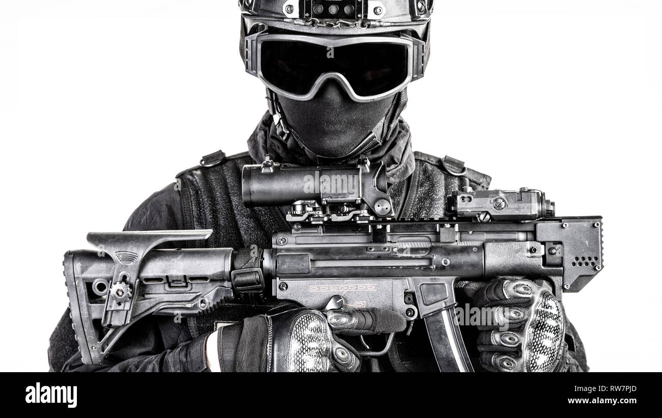 Spec ops police officer SWAT in black uniform and face mask Stock Photo ...