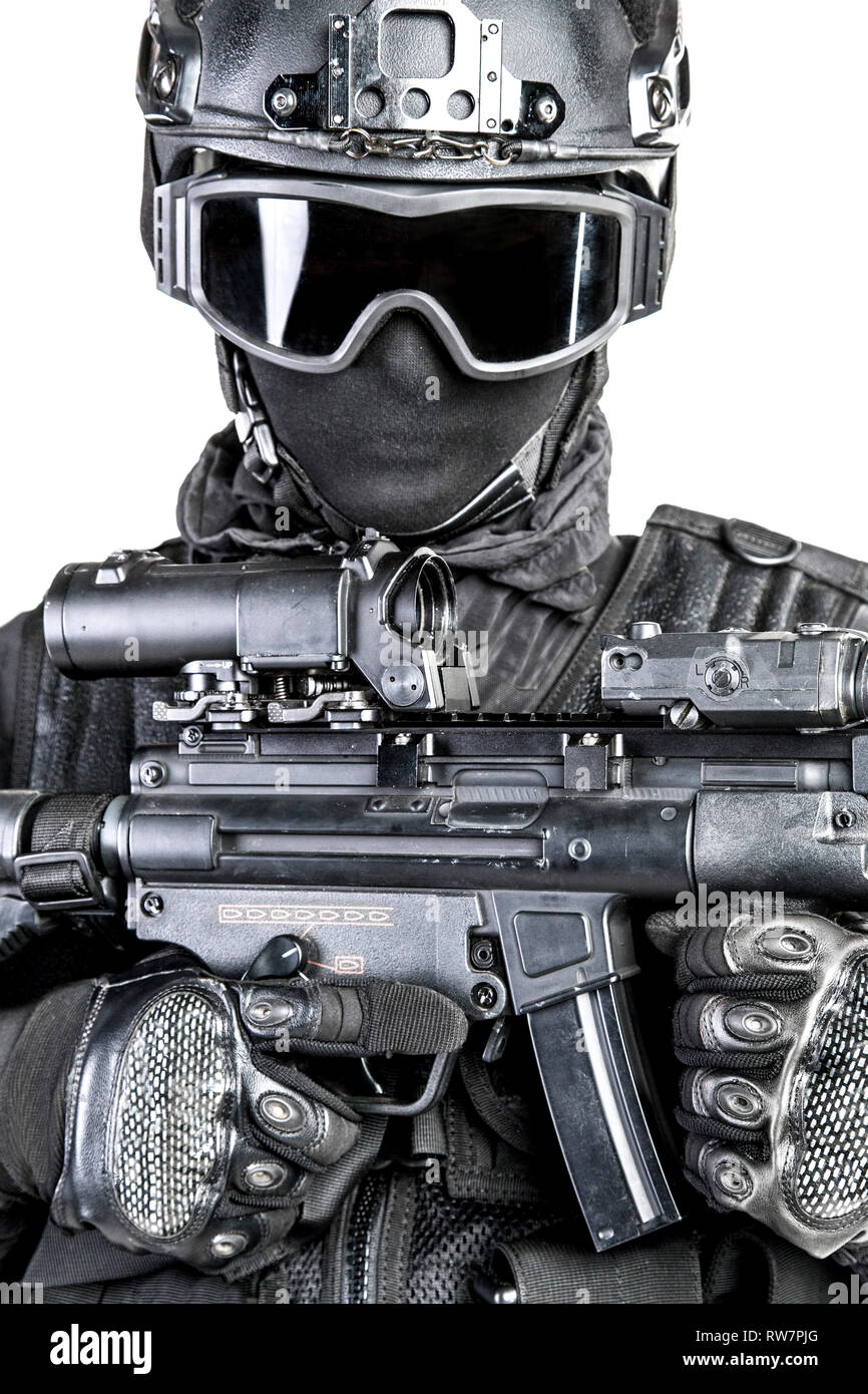 Spec ops police officer SWAT in black uniform and face mask Stock Photo ...