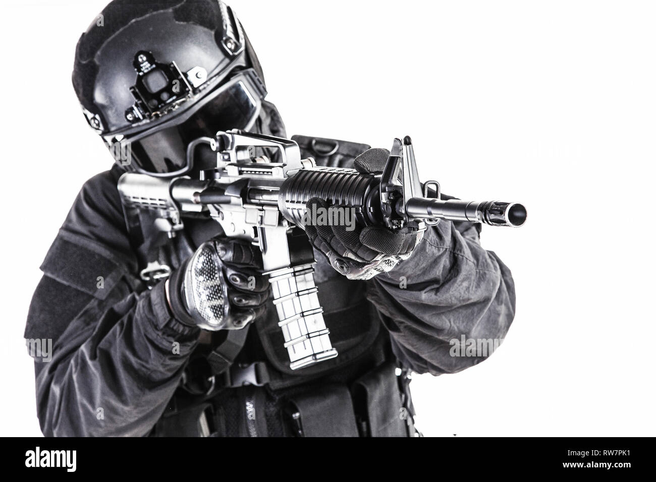 Spec ops police officer SWAT in black uniform and face mask Stock Photo ...