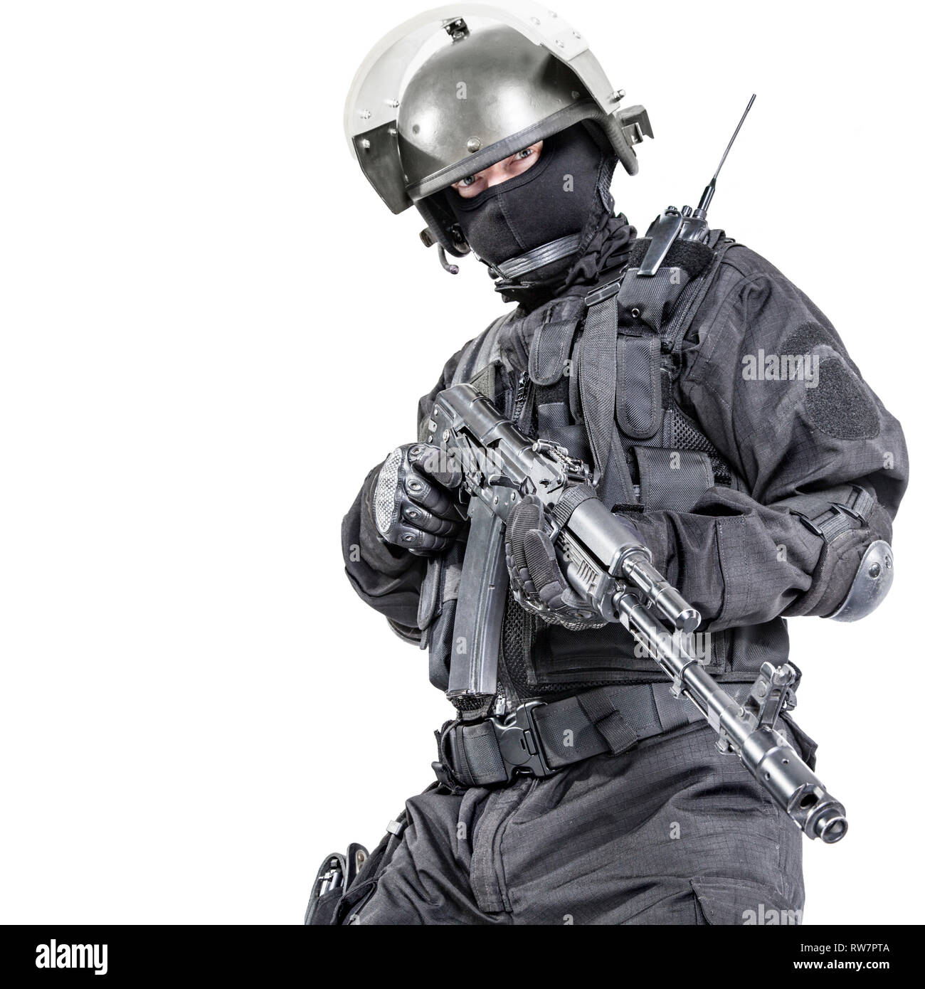 Russian special forces operator in black uniform and bulletproof helmet ...