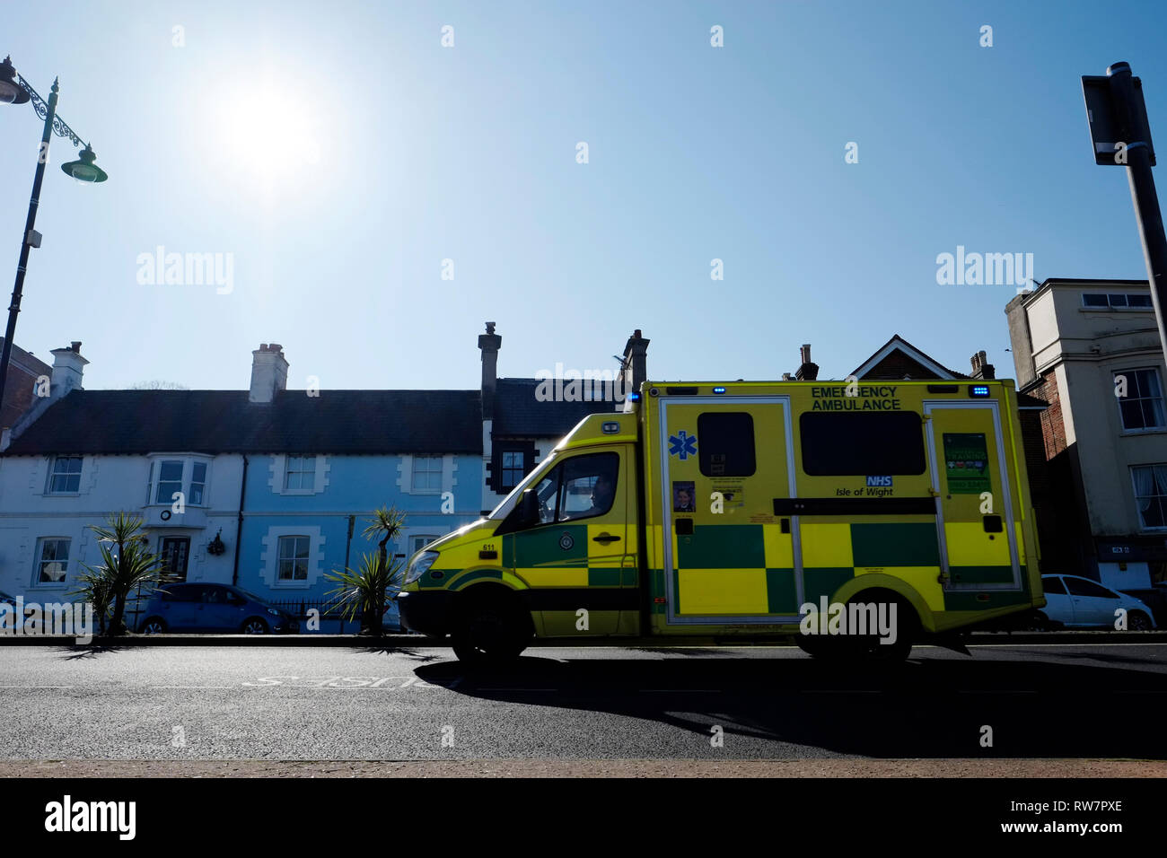 A medical emergency ambulance heads out on a call along Ryde seafront ...
