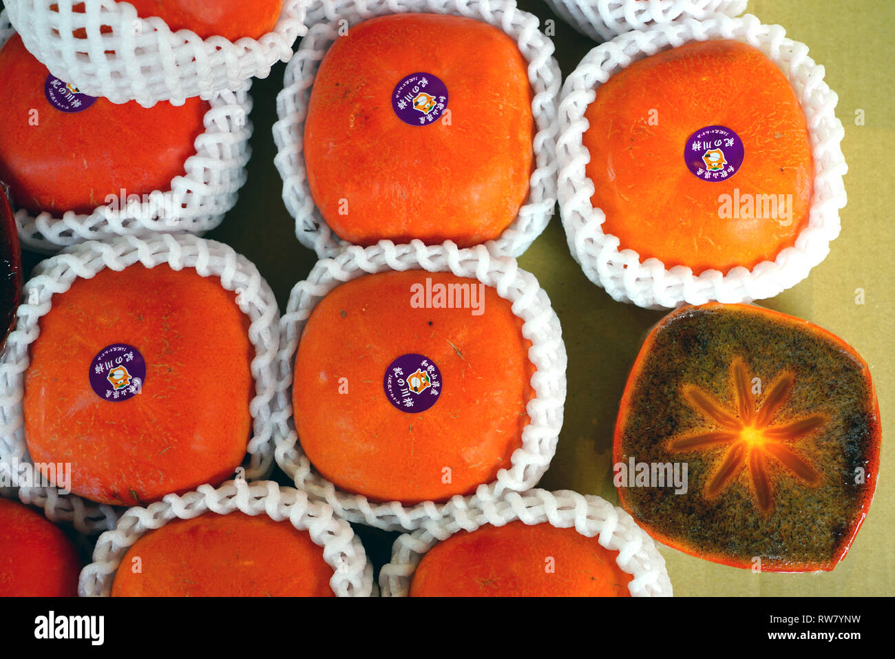 TOKYO, JAPAN -26 OCT 2018- View of expensive black flesh Persimmons ...