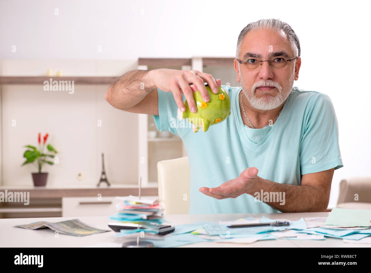 Planning family budget bearded senior hi-res stock photography and ...