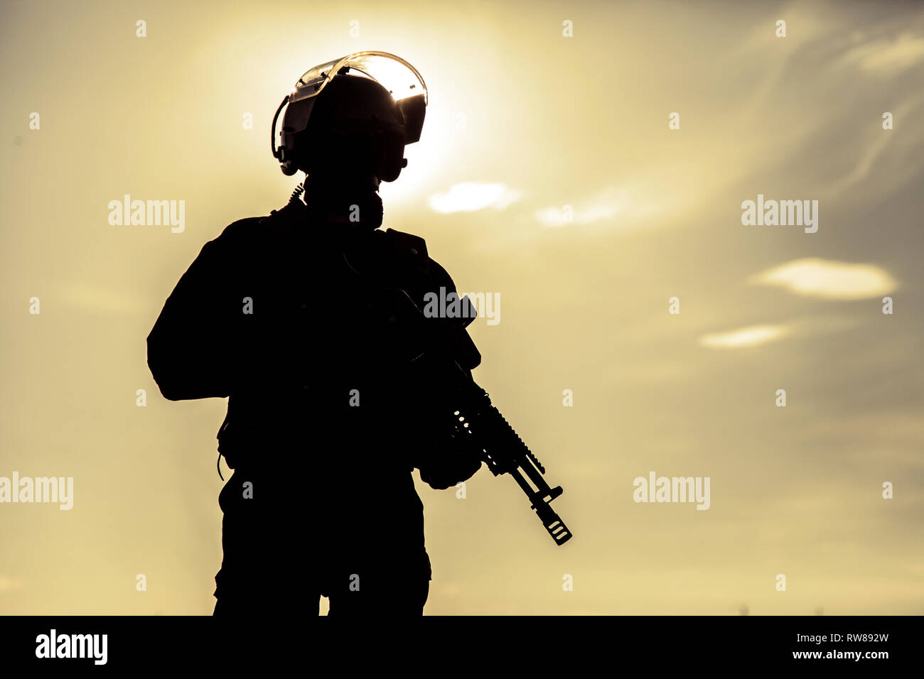 Silhouette of special forces operators with weapon Stock Photo - Alamy