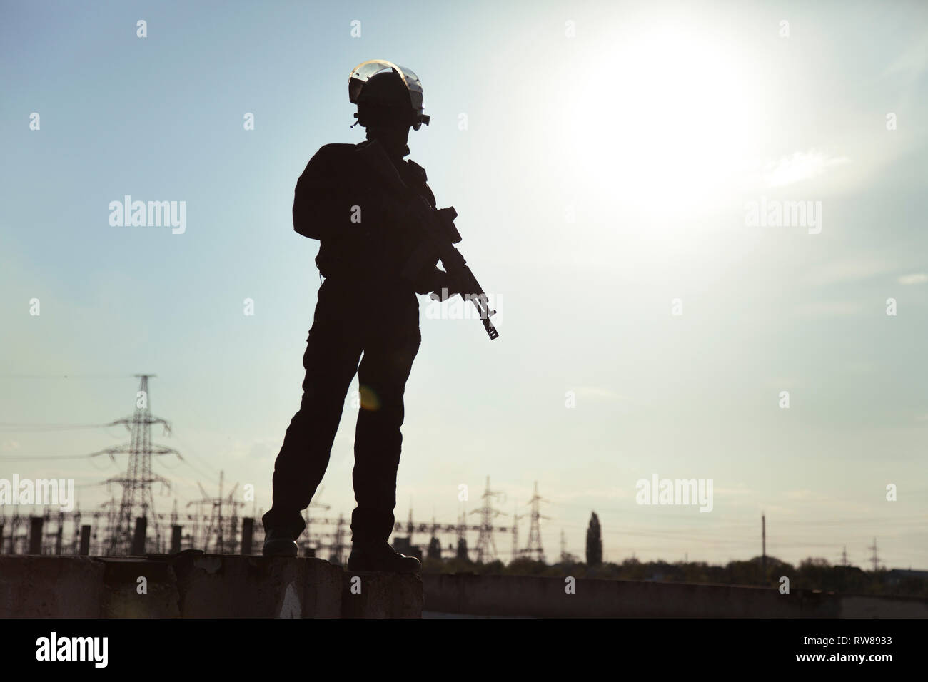 Silhouette of special forces operators with weapon Stock Photo - Alamy