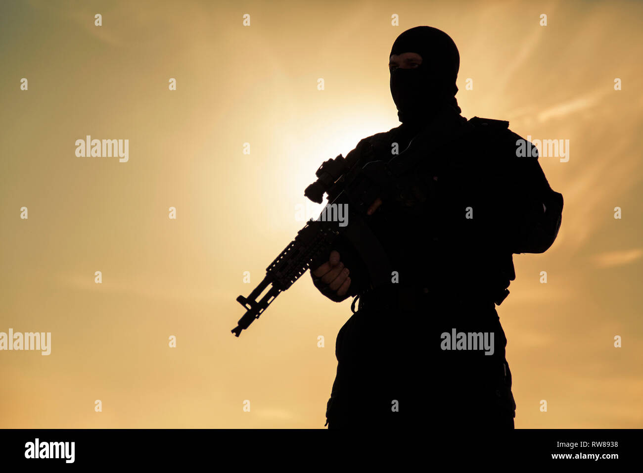 Silhouette of special forces operators with weapon Stock Photo - Alamy