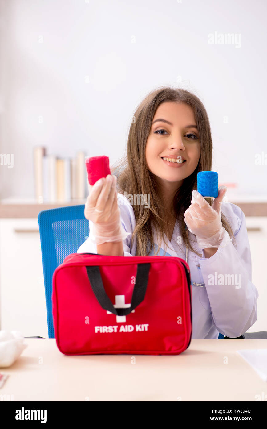 Female beautiful doctor with first aid bag Stock Photo - Alamy