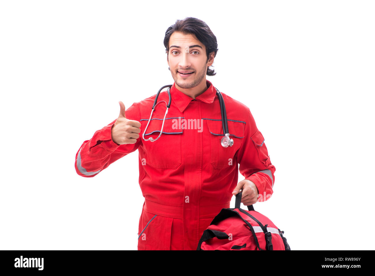 Young paramedic in red uniform isolated on white Stock Photo - Alamy