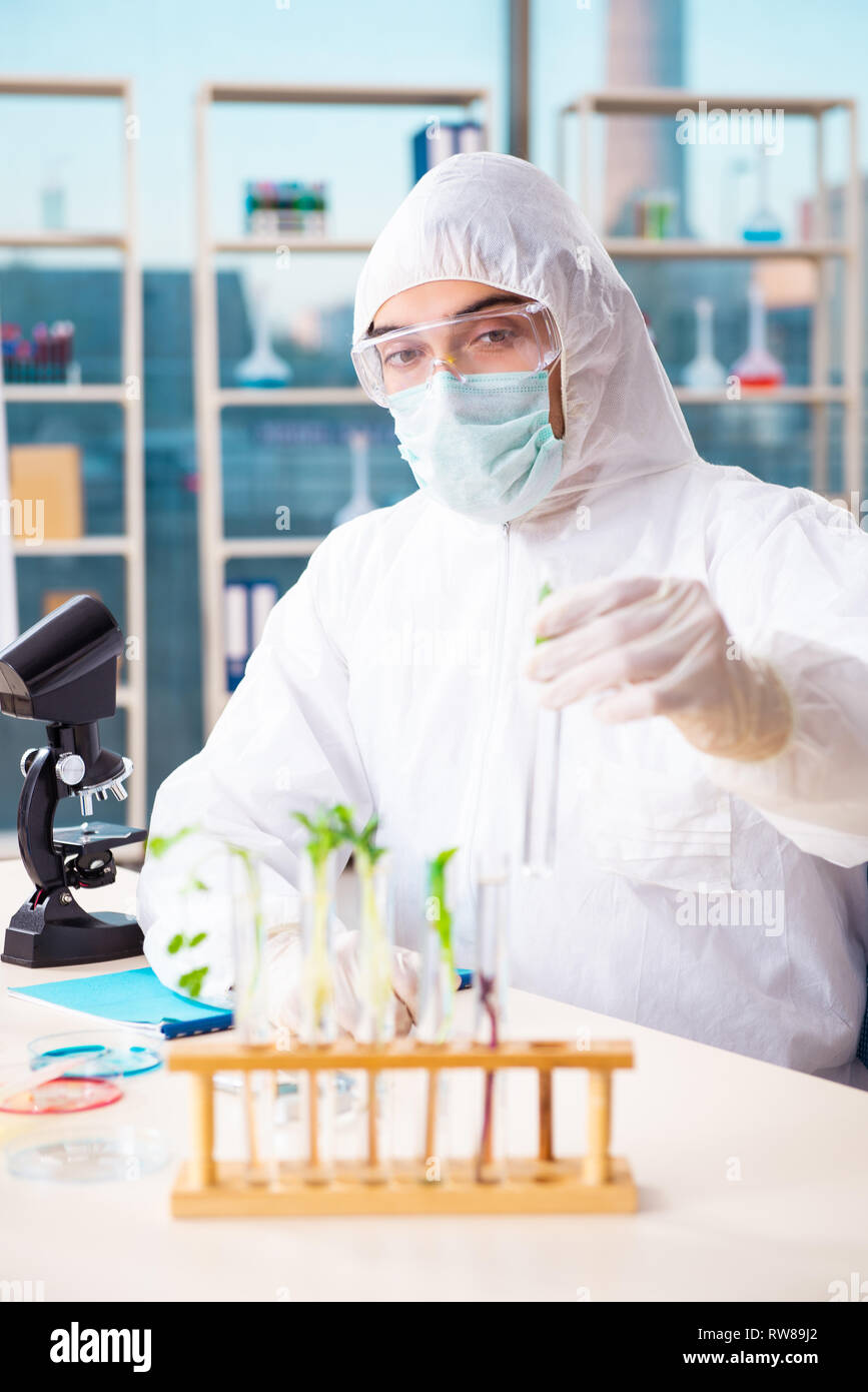 Male biotechnology scientist chemist working in the lab Stock Photo - Alamy