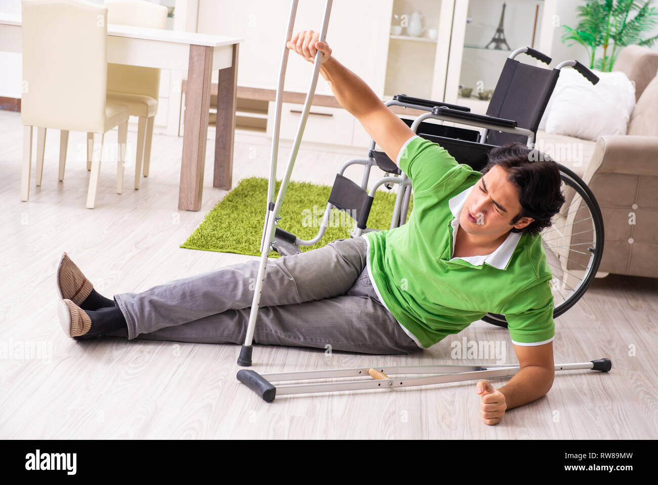 Fall falling wheelchair disabled hi-res stock photography and images ...