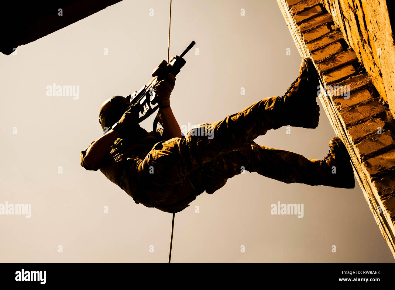 Soldier during assault rappelling exercises with weapons Stock Photo ...