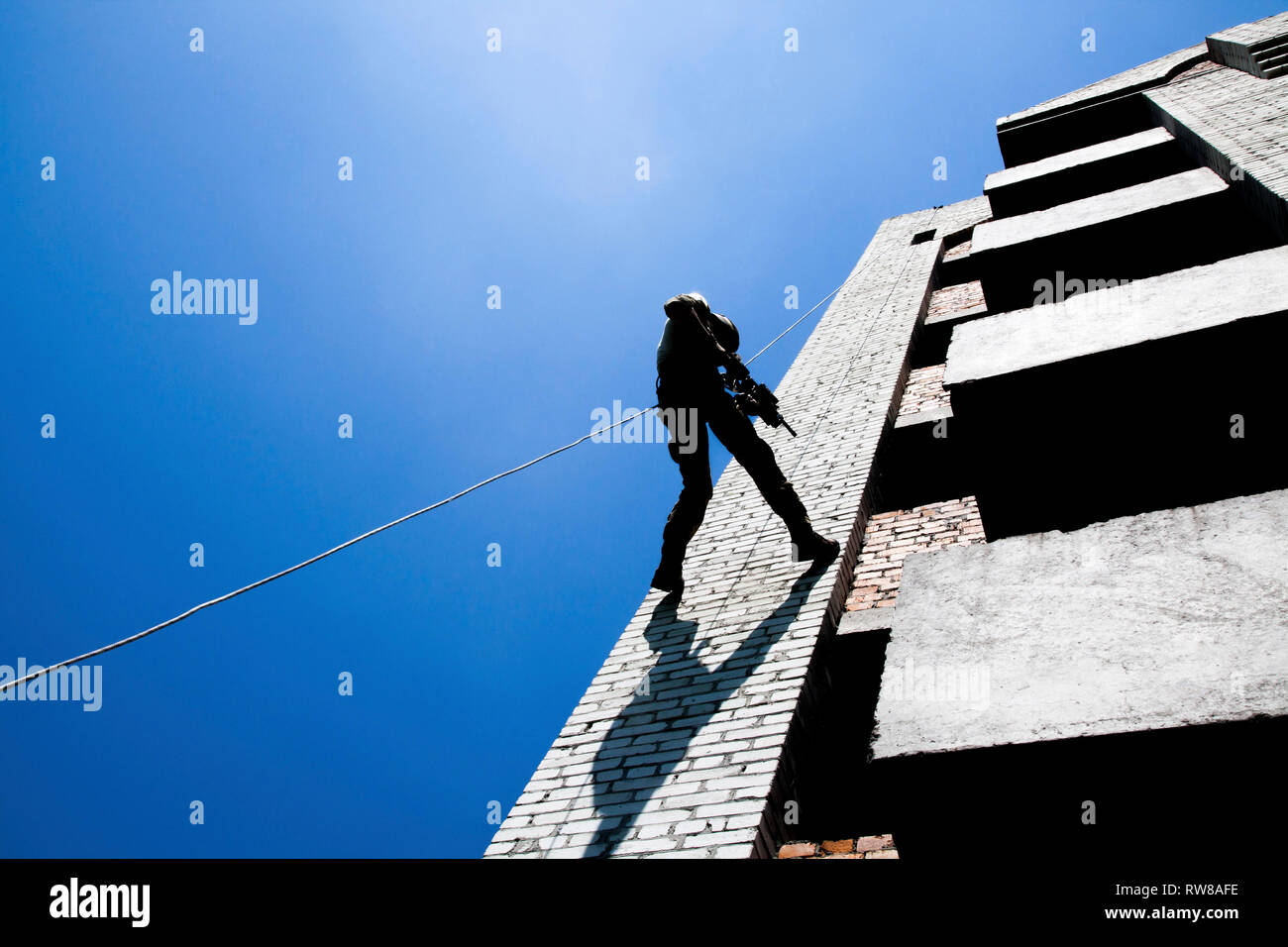 Soldier during assault rappelling exercises with weapons Stock Photo ...