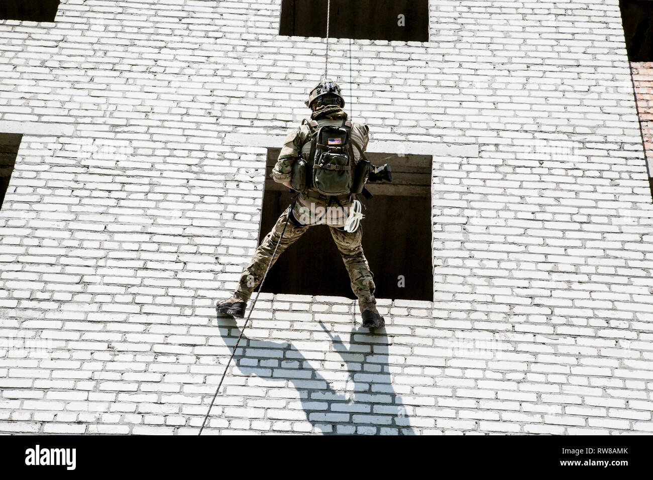 Soldier during assault rappelling exercises with weapons Stock Photo ...