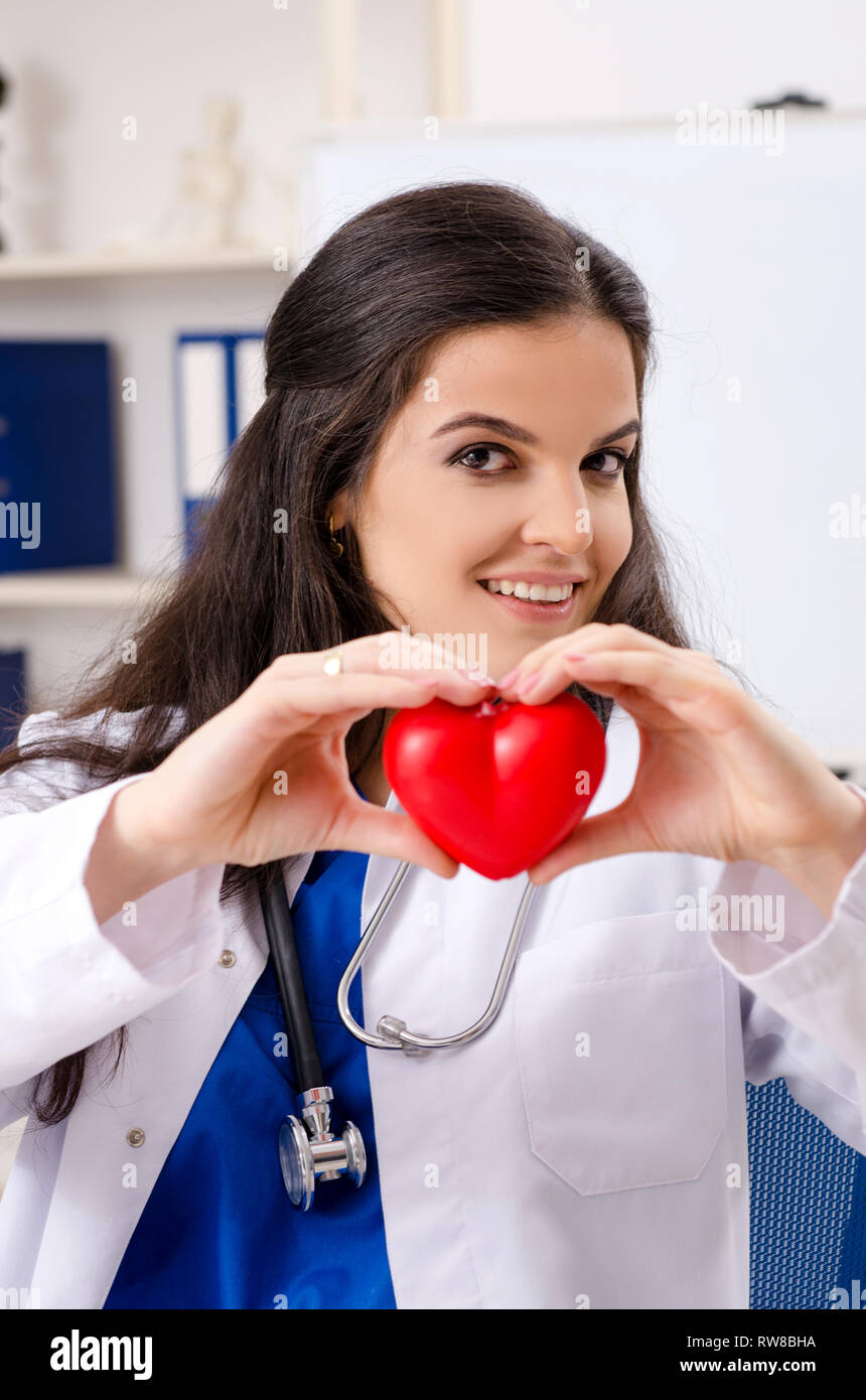 Female doctor cardiologist working in the clinic Stock Photo - Alamy
