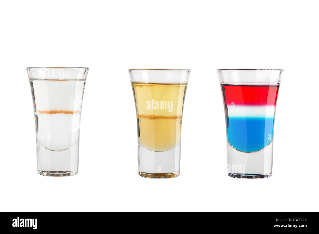 Set of alcohol shots on a white background. Three shots of popular and ...