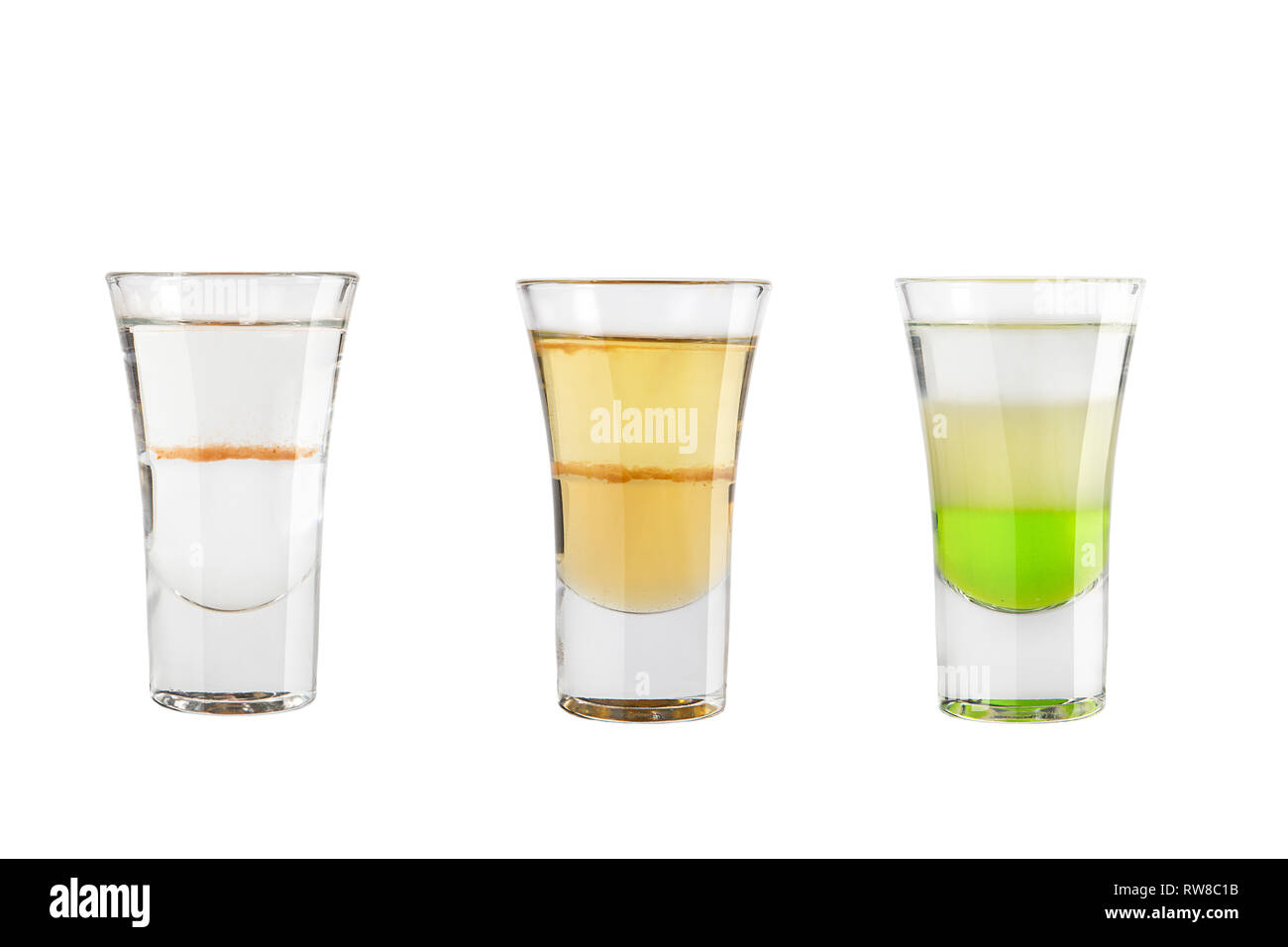 Set of alcohol shots on a white background. Three shots of alcoholic ...