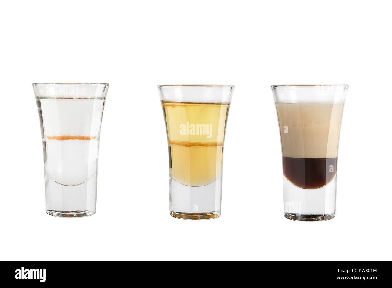 Set of alcohol shots on a white background. Three shots with different ...