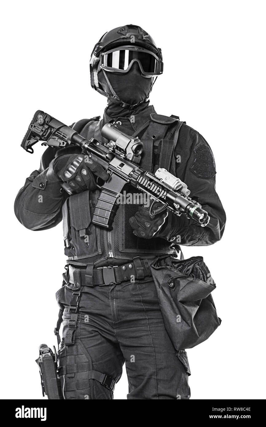 Studio shot of SWAT operator with assault rifle Stock Photo - Alamy