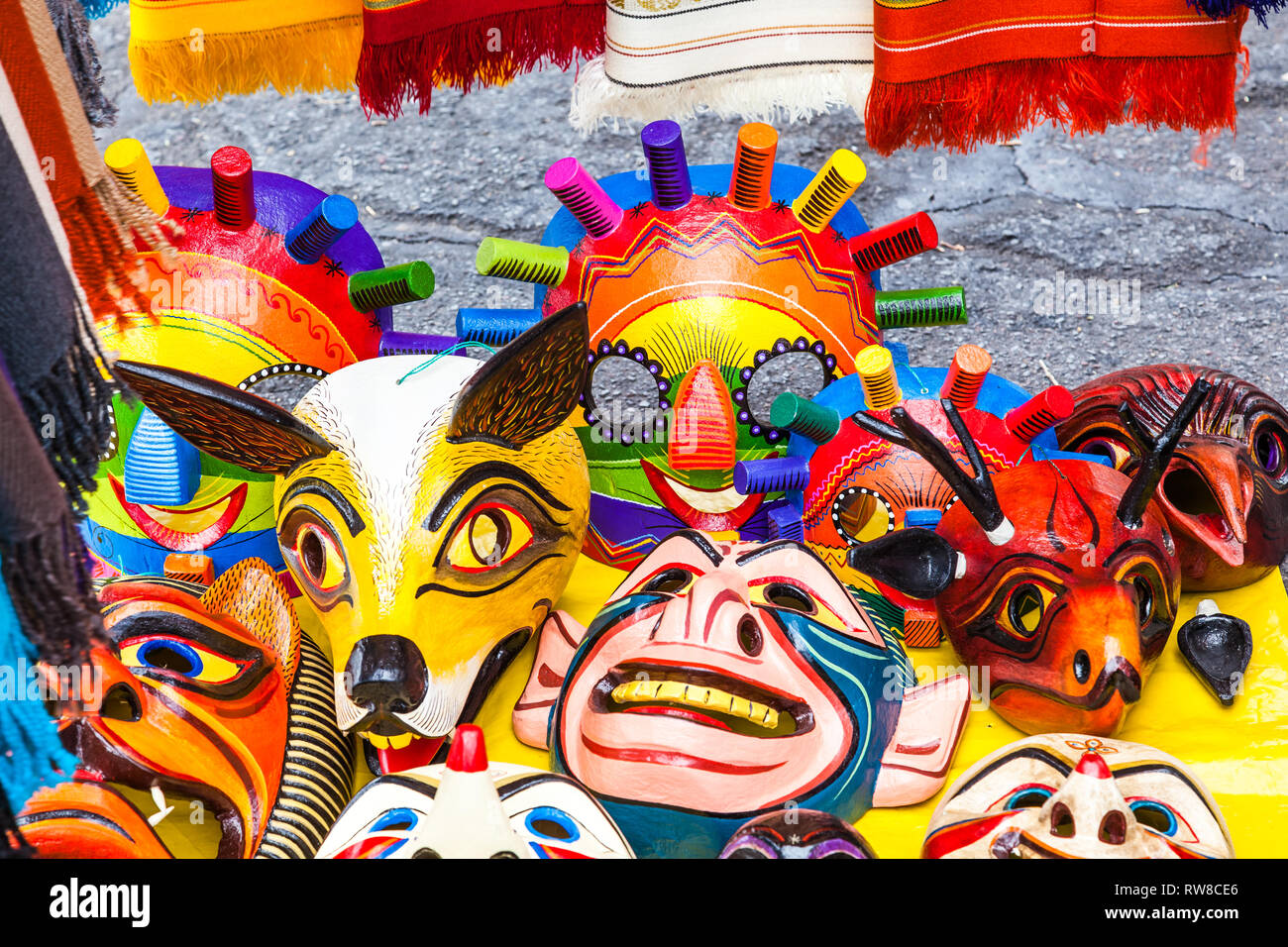 Tigua, Ecuador, July 15, 2018: Masks carved in wood and hand painted ...
