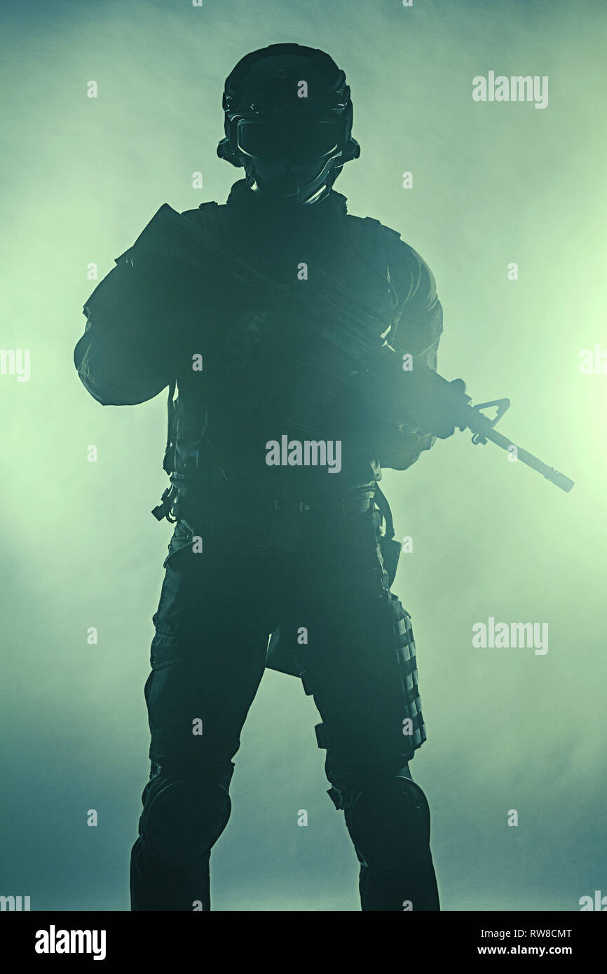 Studio shot of SWAT police special forces, green background Stock Photo ...