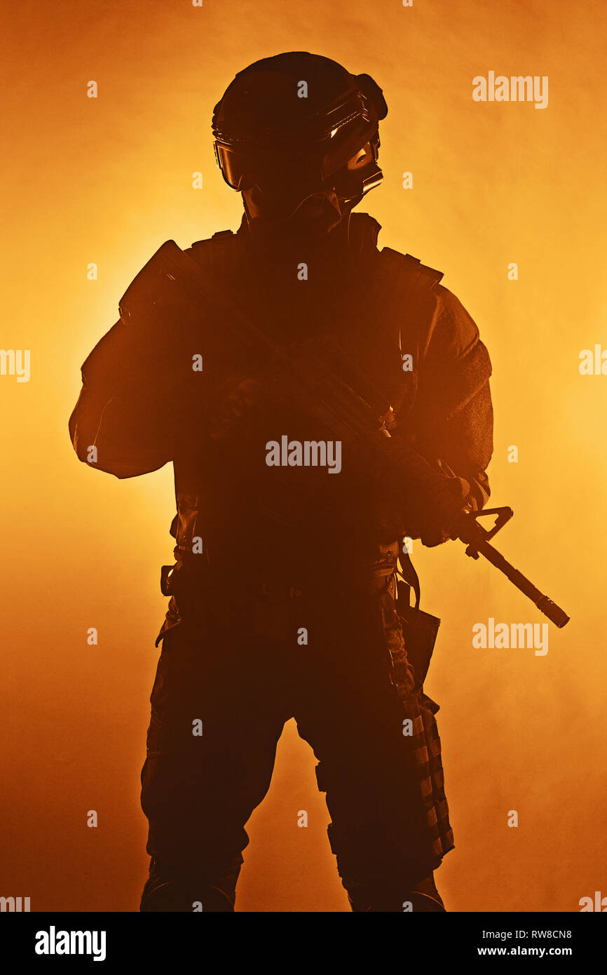 Studio shot of SWAT police special forces, orange fire background Stock ...