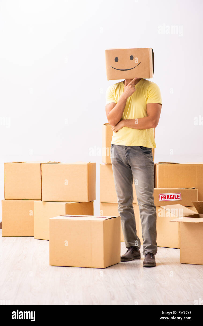 Happy man with box instead of his head Stock Photo - Alamy
