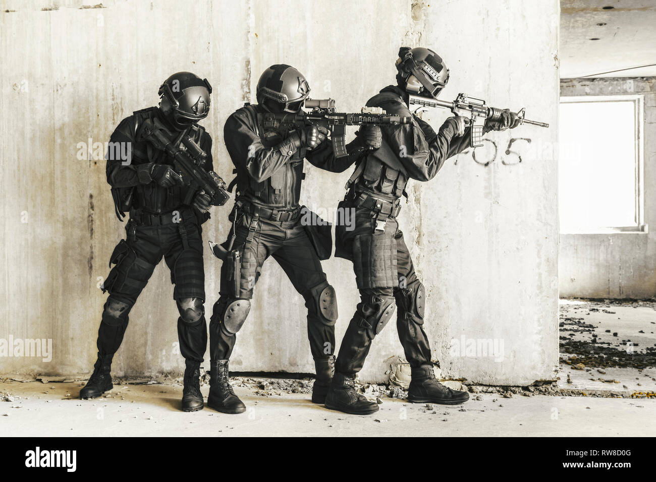Squad of SWAT police special forces in action Stock Photo - Alamy