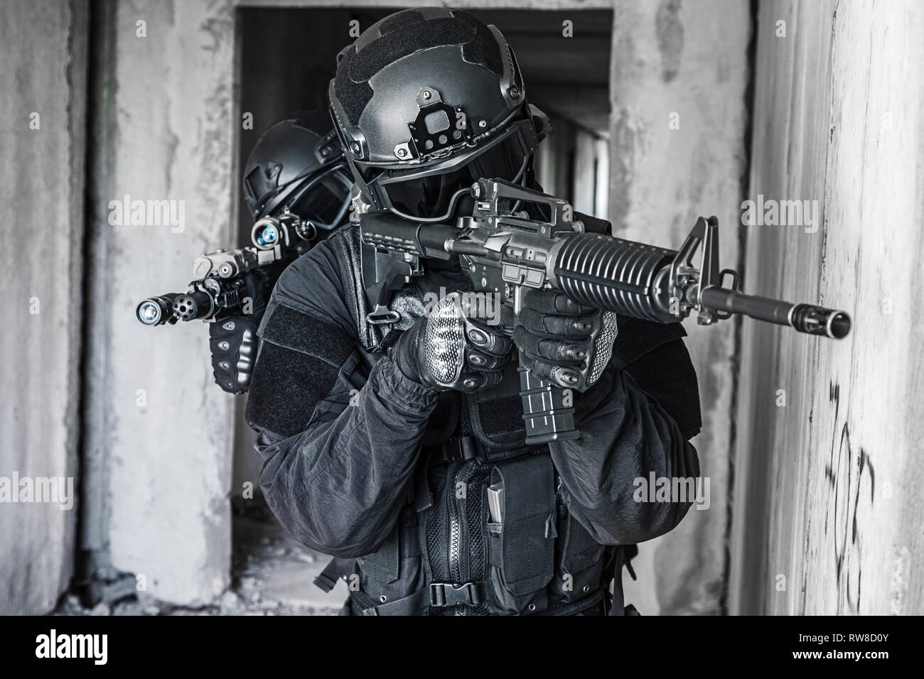 Squad of SWAT police special forces in action Stock Photo - Alamy