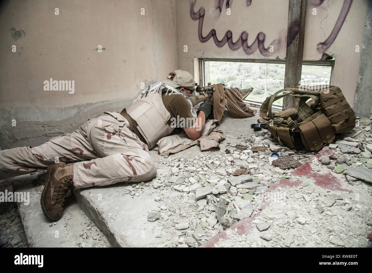 Navy Seal sniper with rifle in action Stock Photo - Alamy