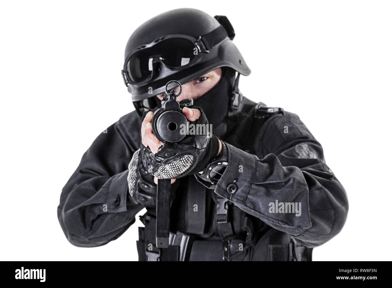 Spec ops police officer SWAT in black uniform, studio shot Stock Photo ...