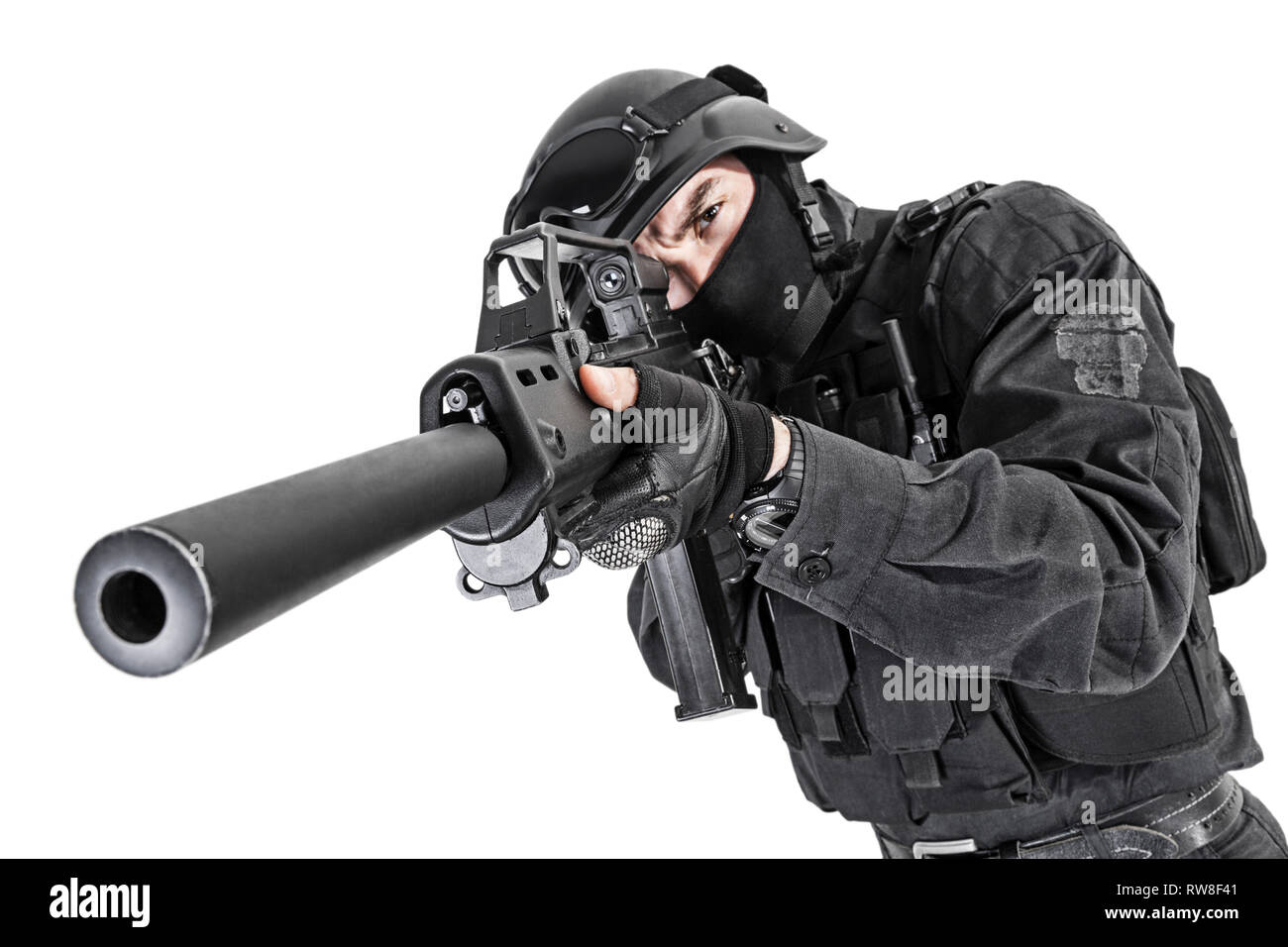 Spec ops police officer SWAT in black uniform, studio shot Stock Photo ...