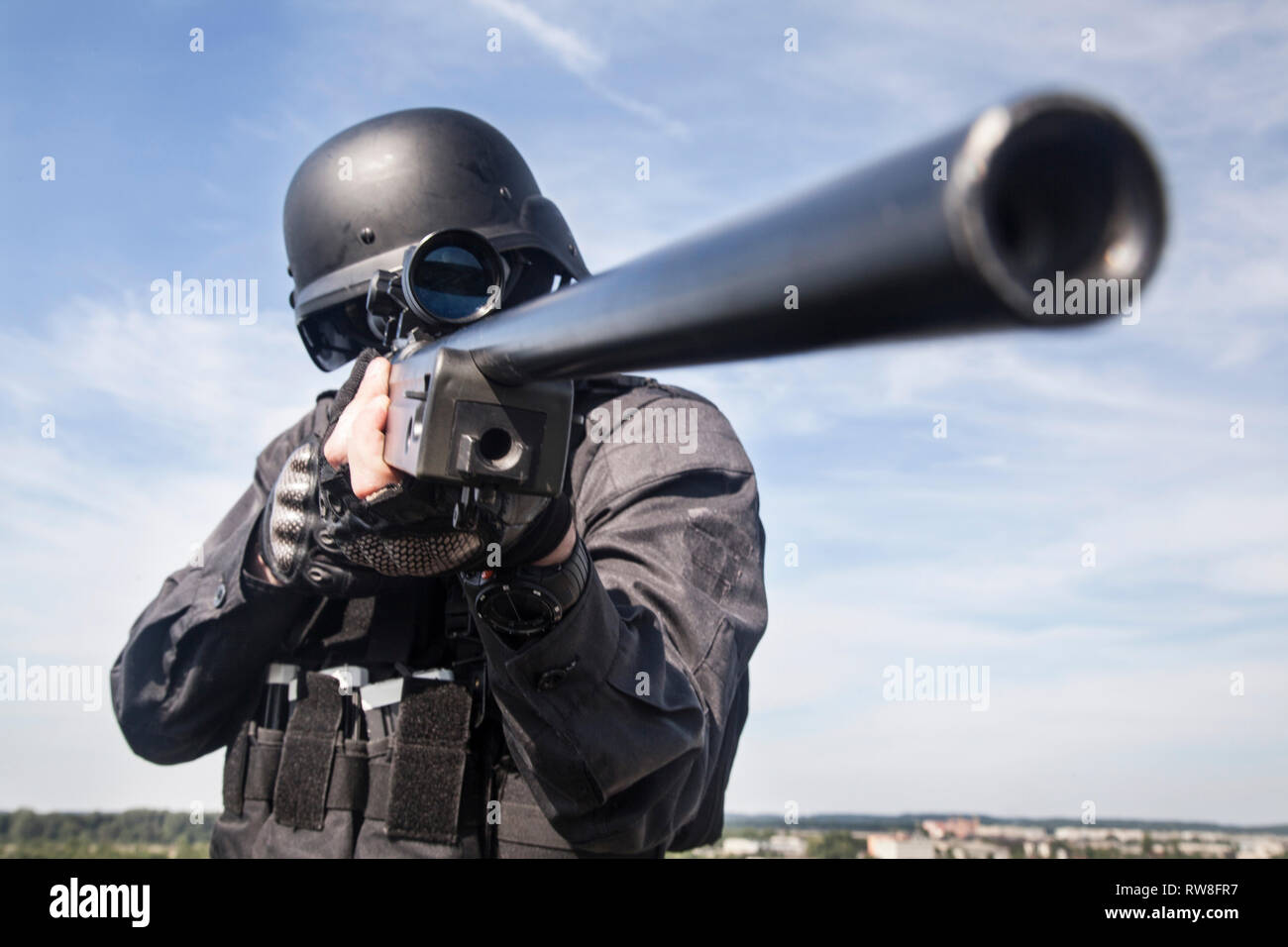 SWAT police sniper in black uniform Stock Photo - Alamy