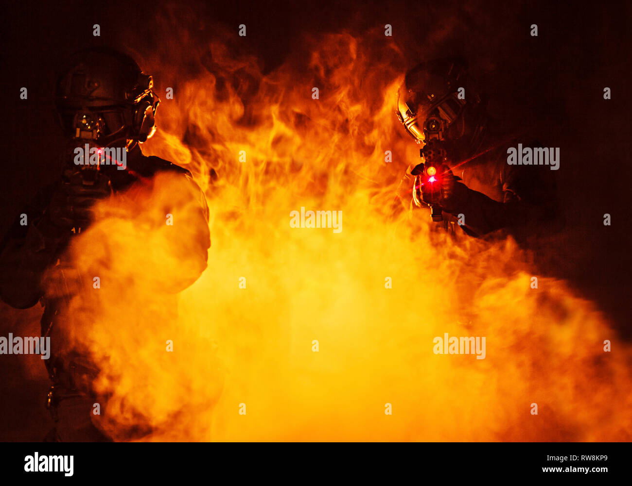 Police officers SWAT wearing black uniform in the smoke with laser ...