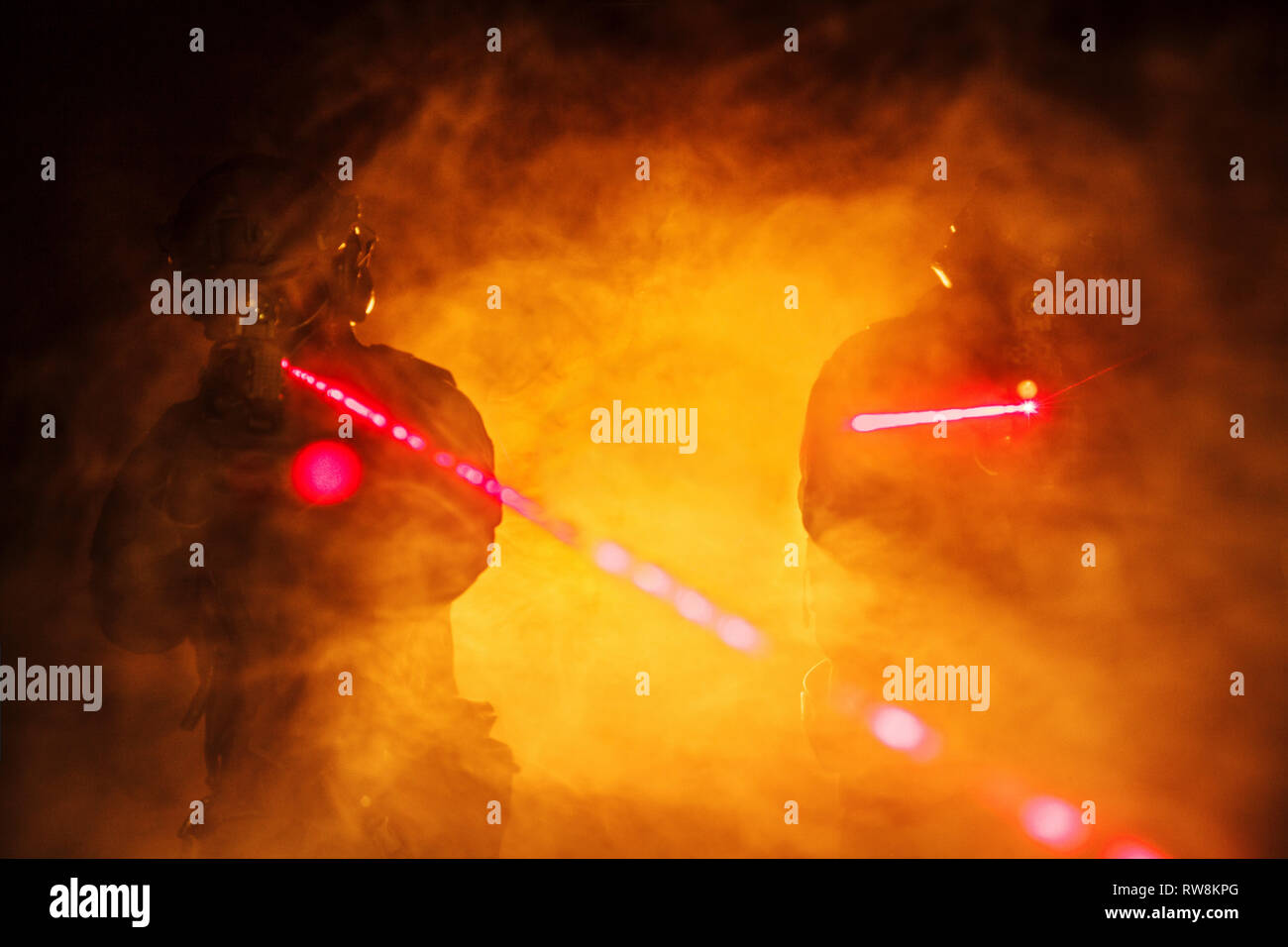 Police officers SWAT wearing black uniform in the smoke with laser ...