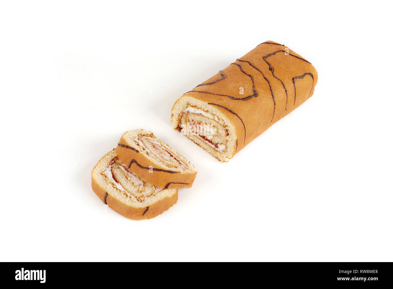 Biscuit roll cut into pieces, on a white background Stock Photo - Alamy