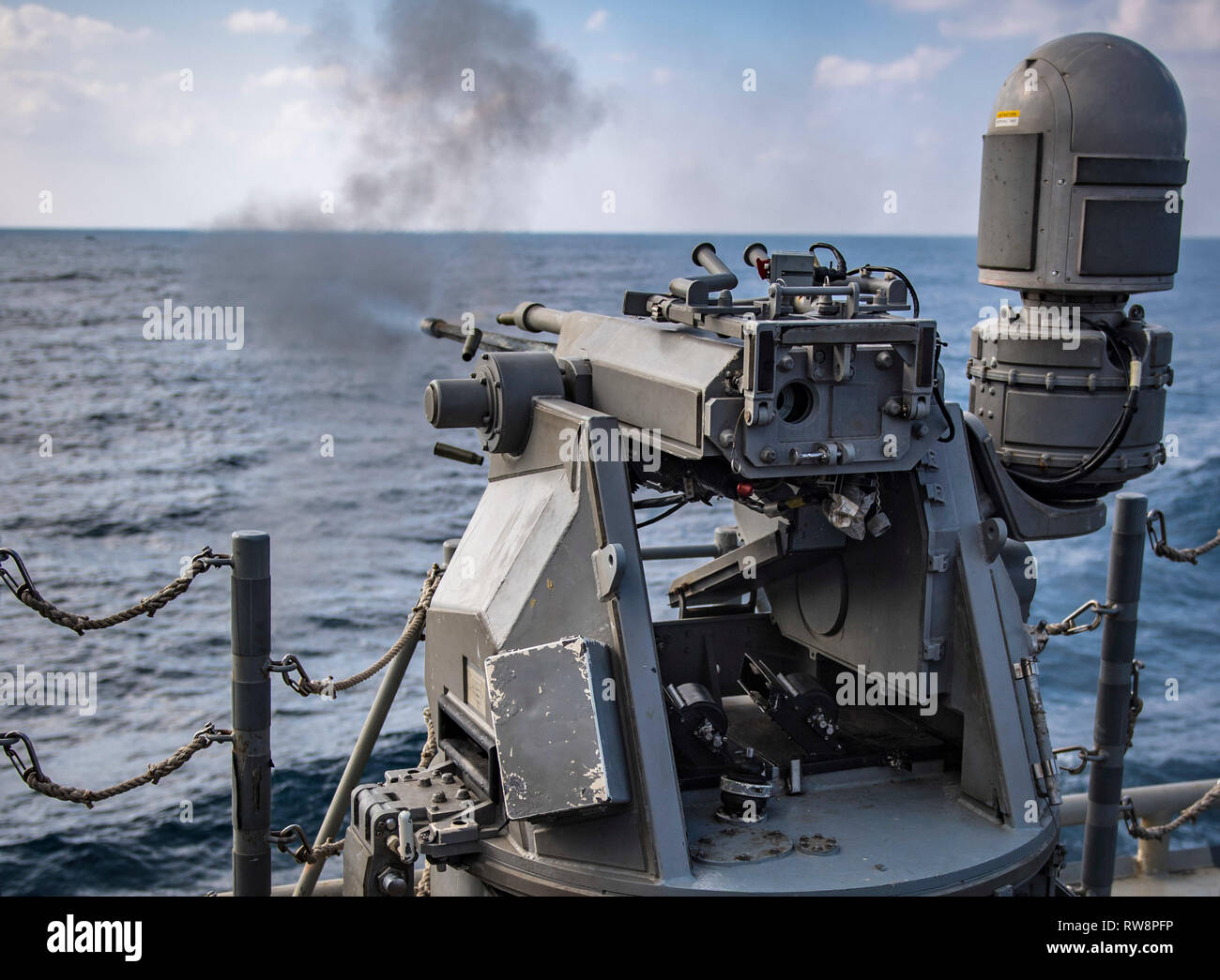 190302-N-HI376-1187 PHILLIPINE SEA (Mar. 02, 2018) A MK-38 25mm machine ...