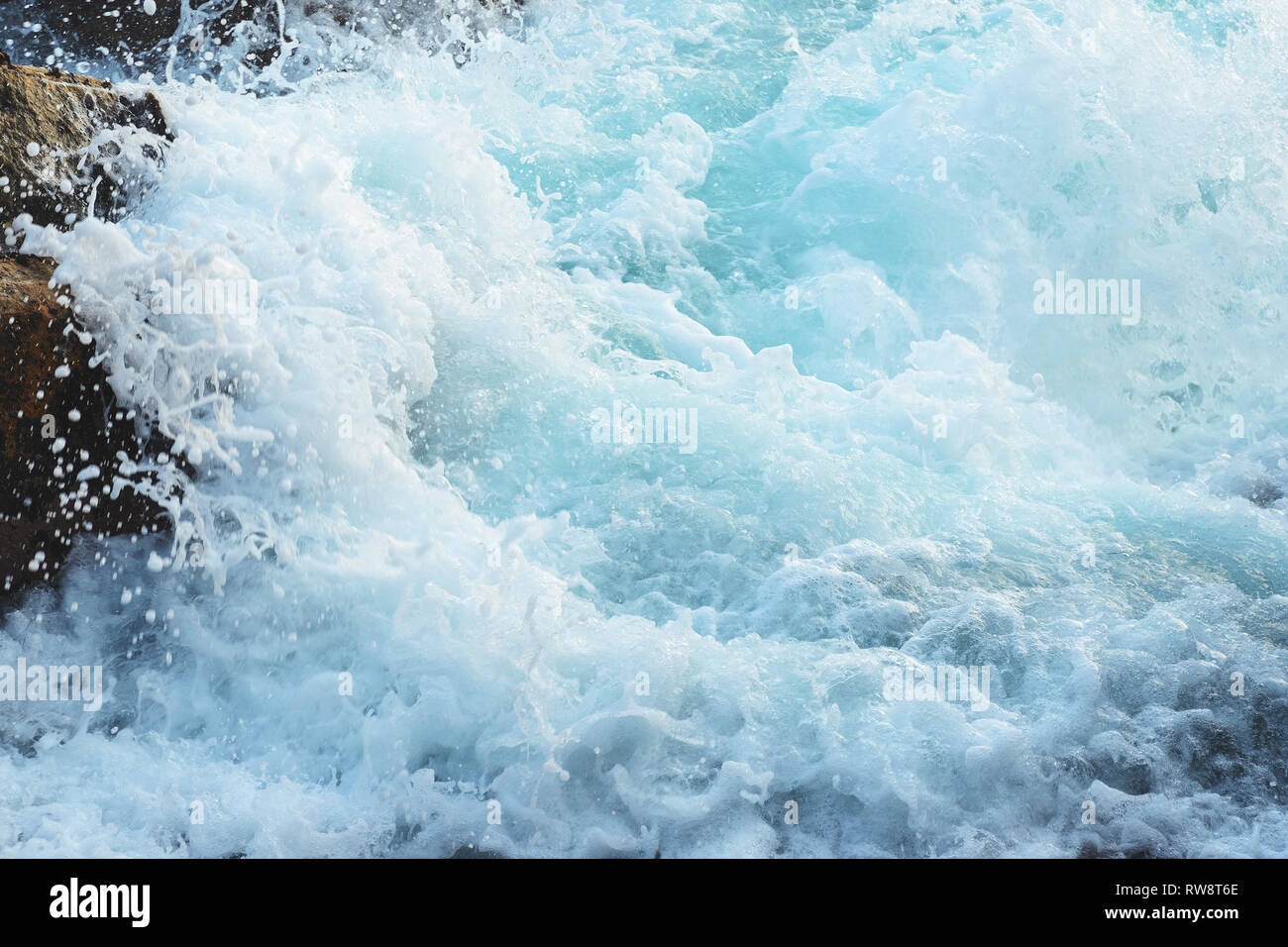 Foaming blue water surface, water from top view, sea water with foam ...