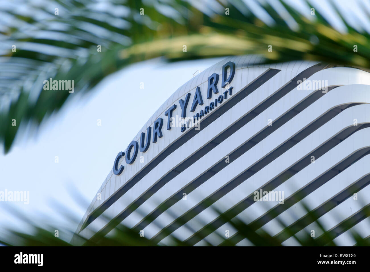 Batumi, Georgia, 2018-10-10: Marriott Courtyard sign surrounded by palm ...