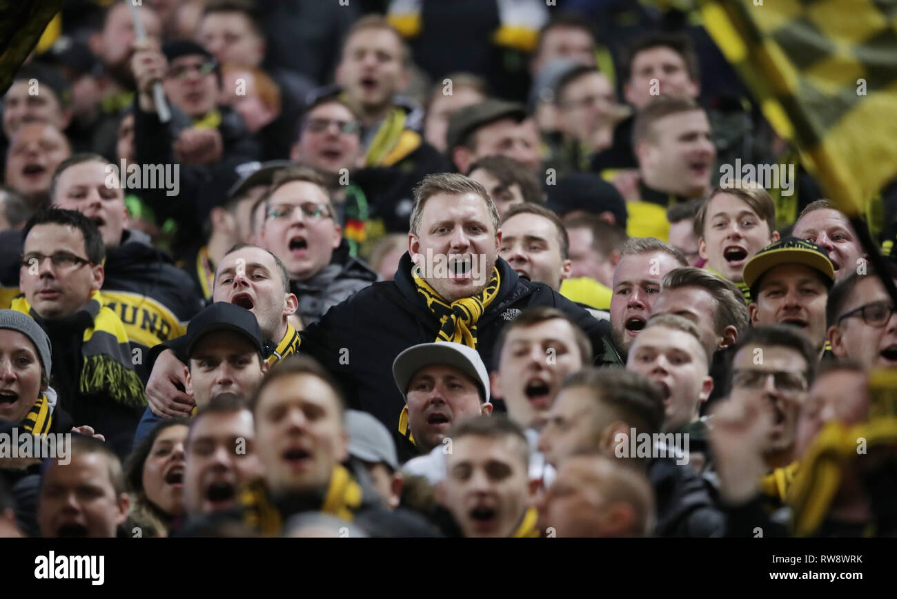Borussia Dortmund fans in the stands show their support Stock Photo - Alamy
